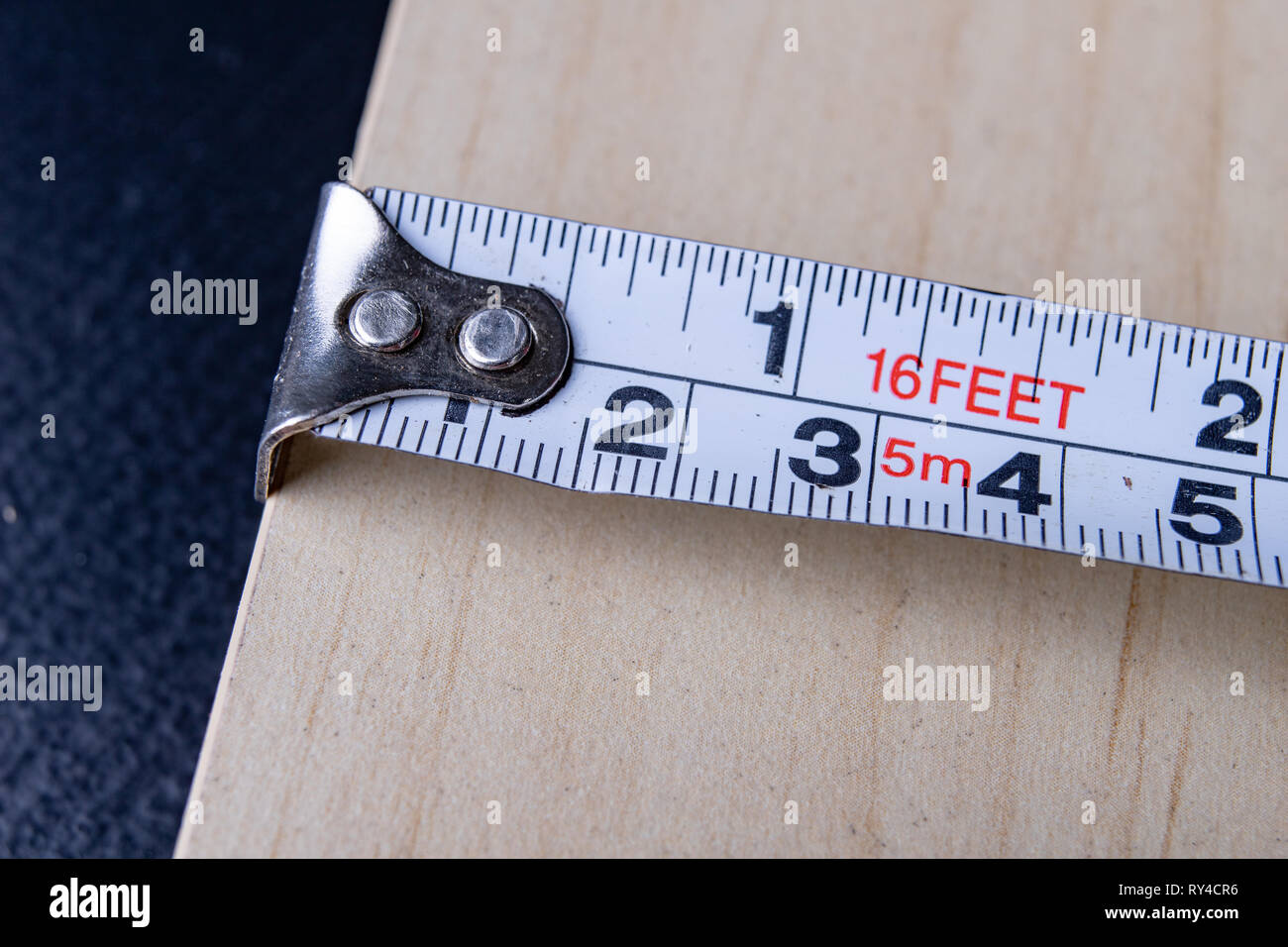 Steel measure and pencil used for measuring in carpentry. Diy ...