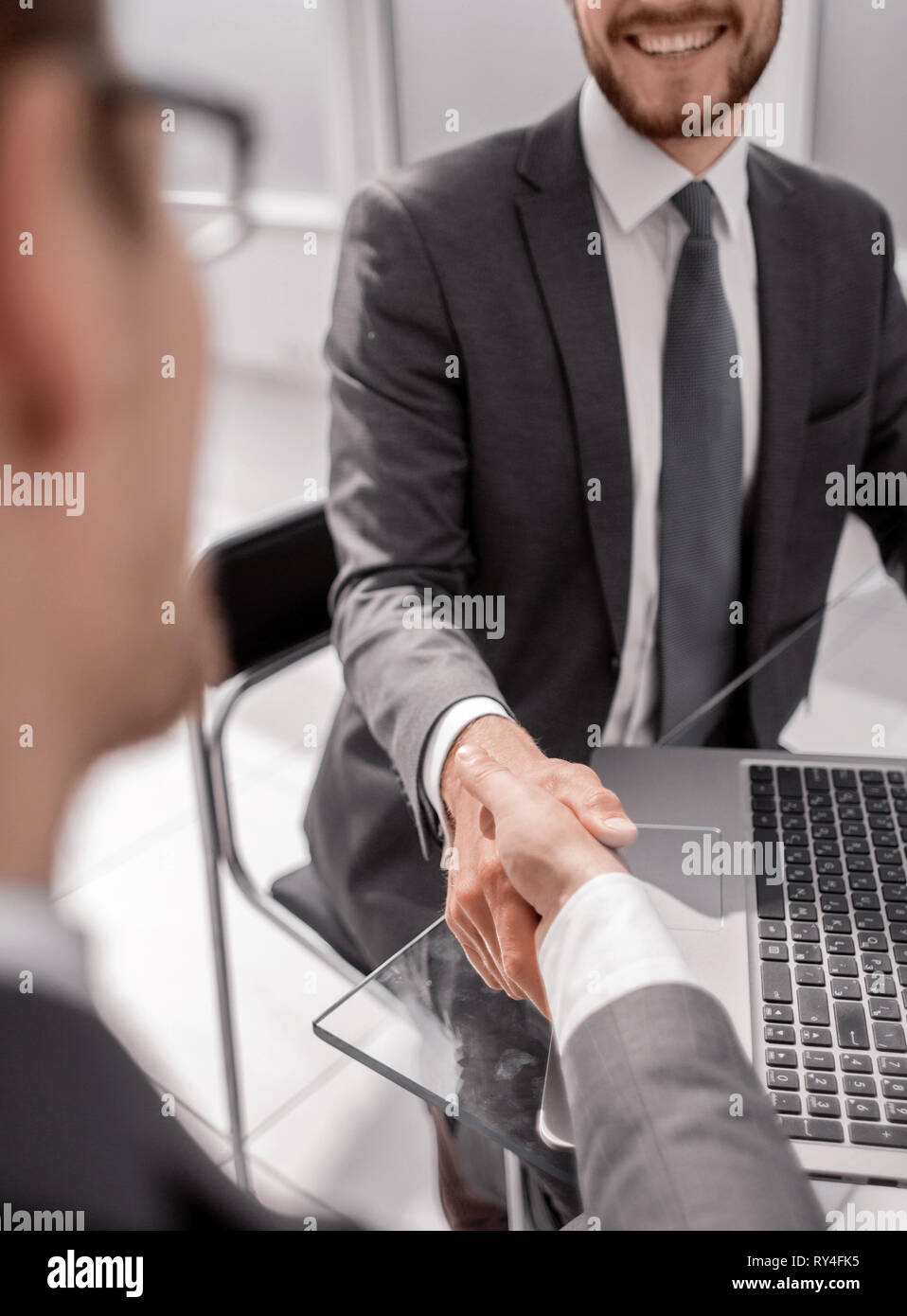 close up.handshake business people in the Bank office Stock Photo - Alamy