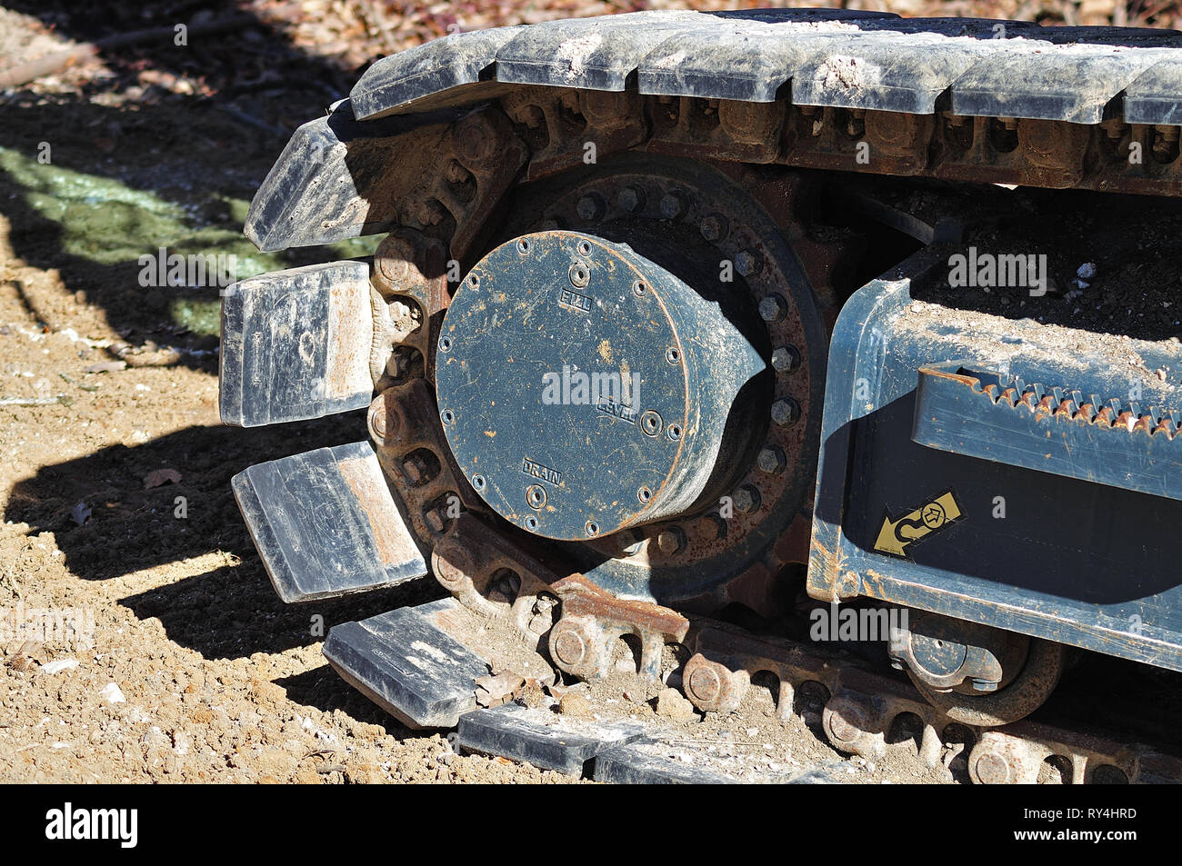 close-up of the crawler track of an excavator at construction site ...