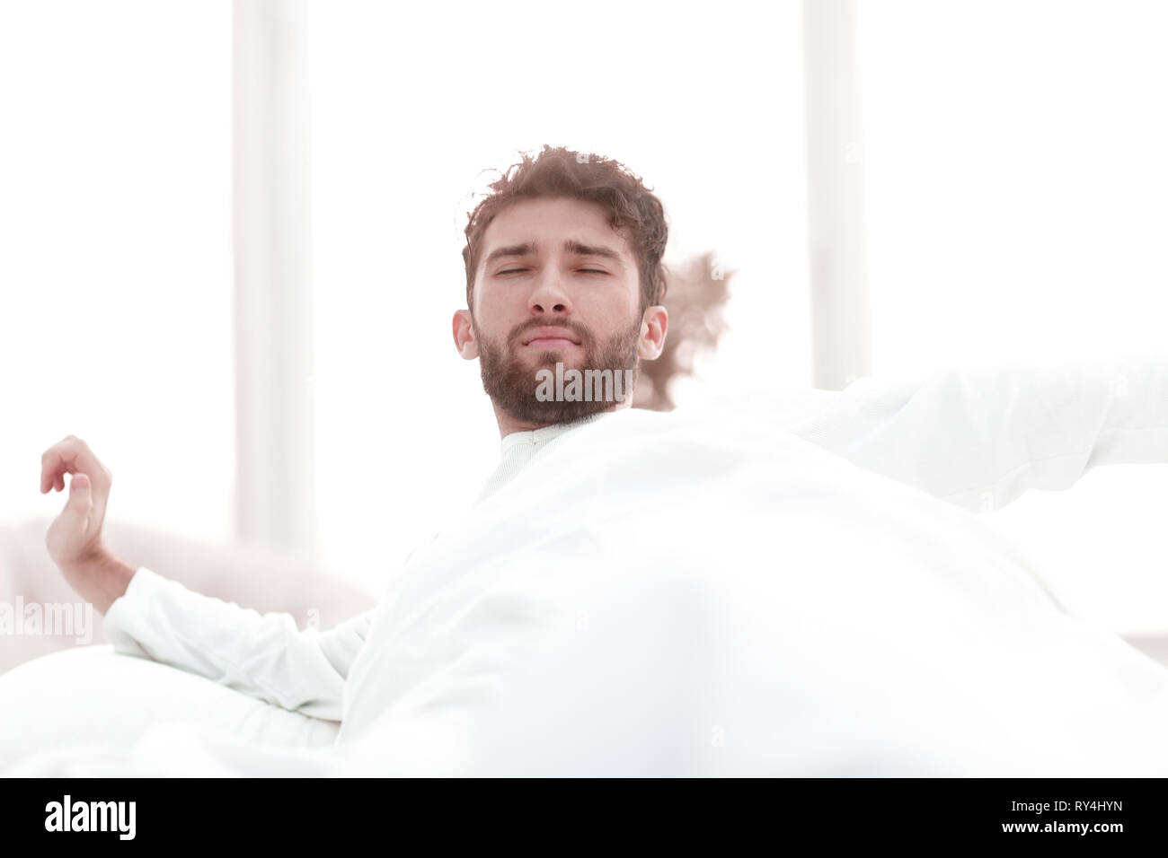 closeup.tired man sleeping on the bed Stock Photo - Alamy
