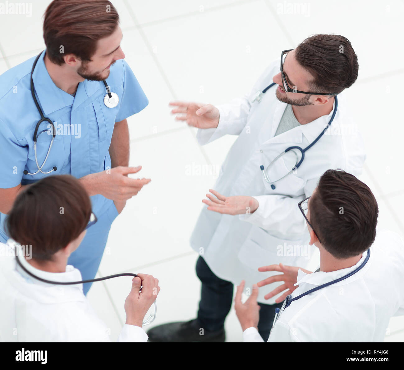 view from the top.a group of doctors discussing ideas Stock Photo - Alamy