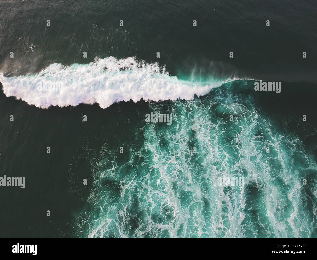 Aerial top view of ocean wave with foam. Drone Photo Stock Photo - Alamy