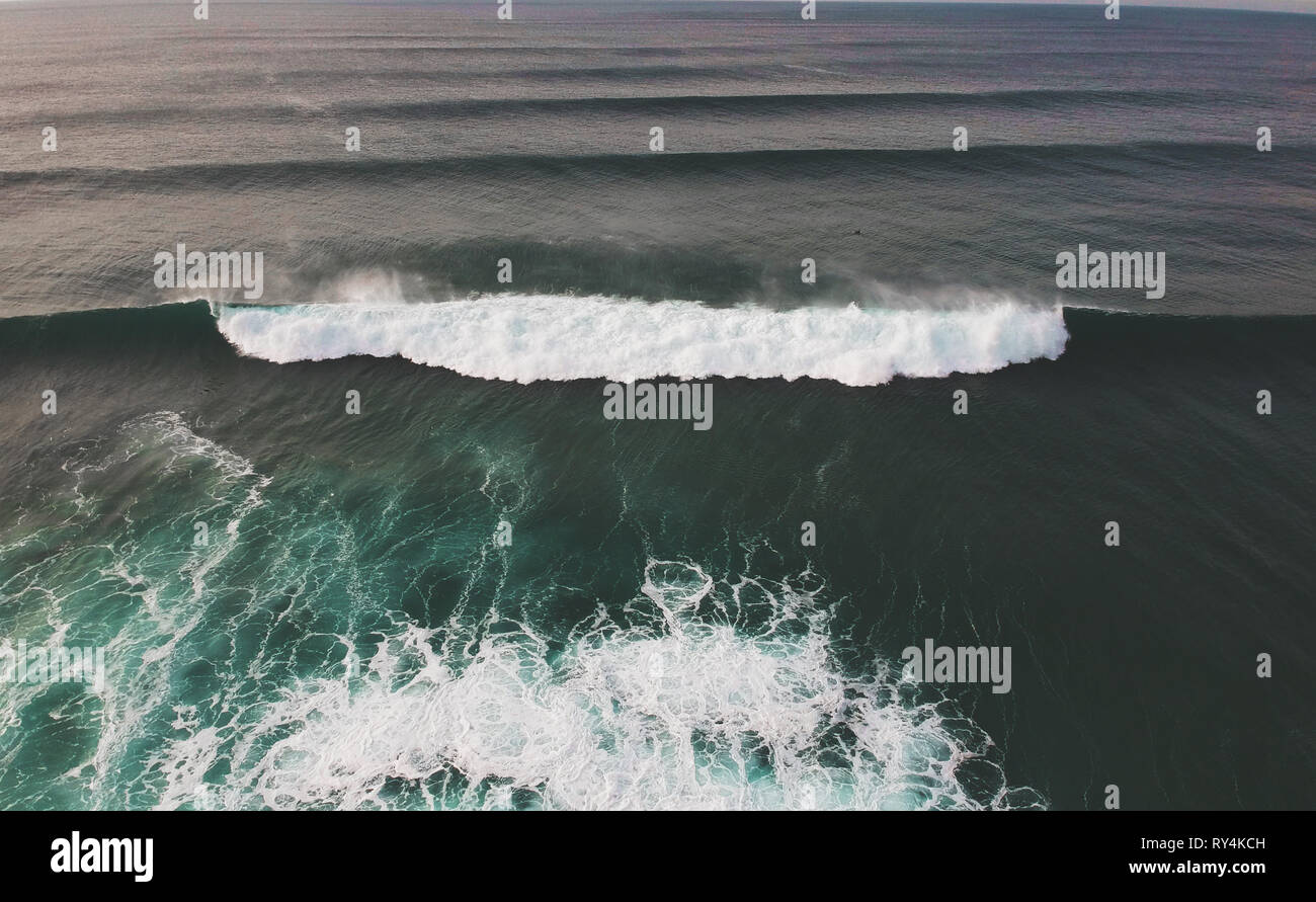 Aerial top view of ocean wave with foam. Drone Photo Stock Photo - Alamy