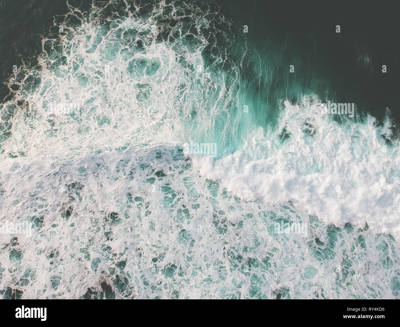 Aerial top view of ocean wave with foam. Drone Photo Stock Photo - Alamy