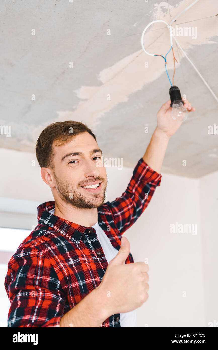 Changing light bulb hi-res stock photography and images - Alamy