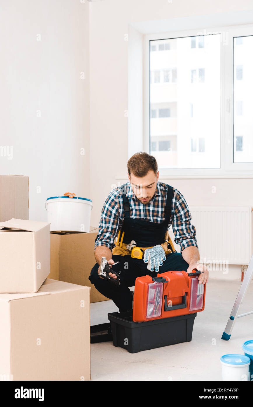 Serious adult handyman in hi-res stock photography and images - Alamy