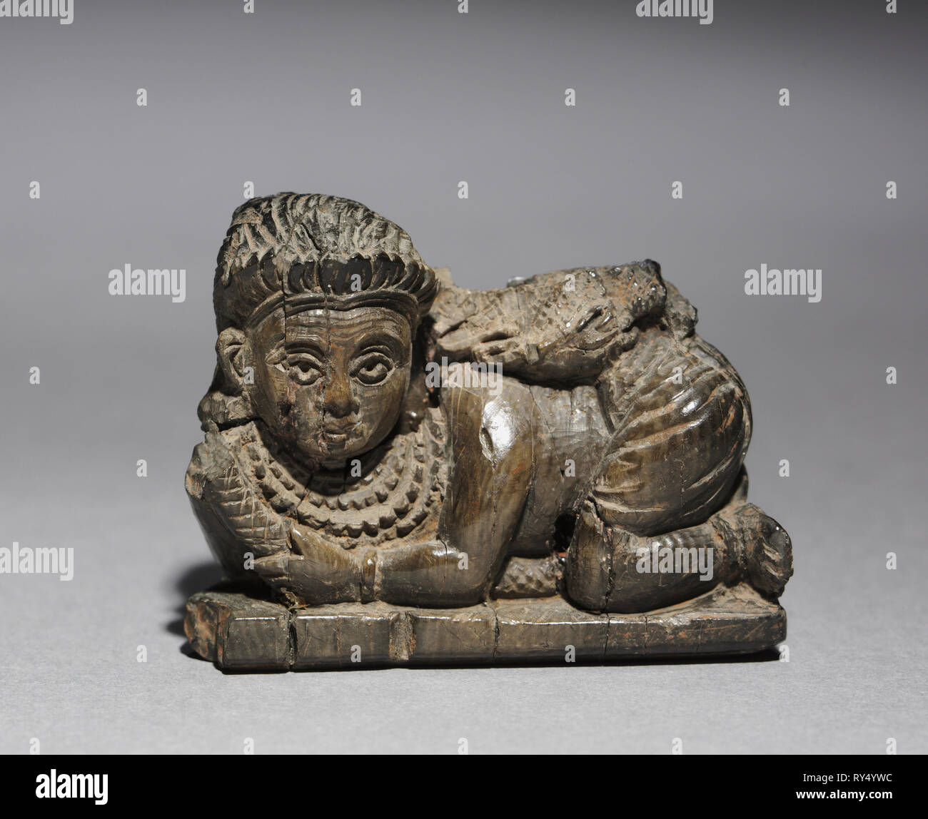 Figurine of a Crouching Woman, 900-800 BC. Phoenician, Syria, Arslan ...
