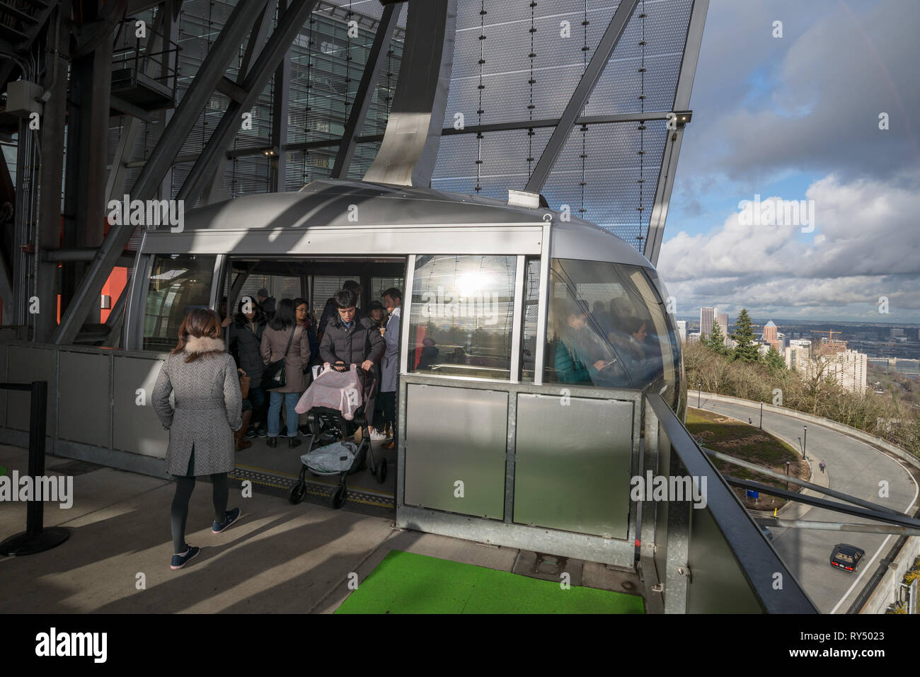 Commuters boarding Portland Aerial Tram at OHSU, Portland, Oregon Stock ...