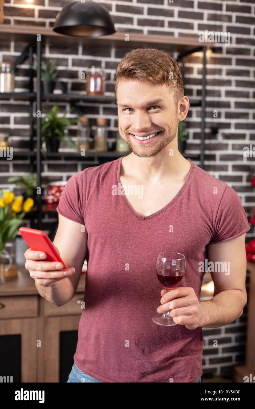 Bearded husband feeling excited before romantic dinner with his woman ...