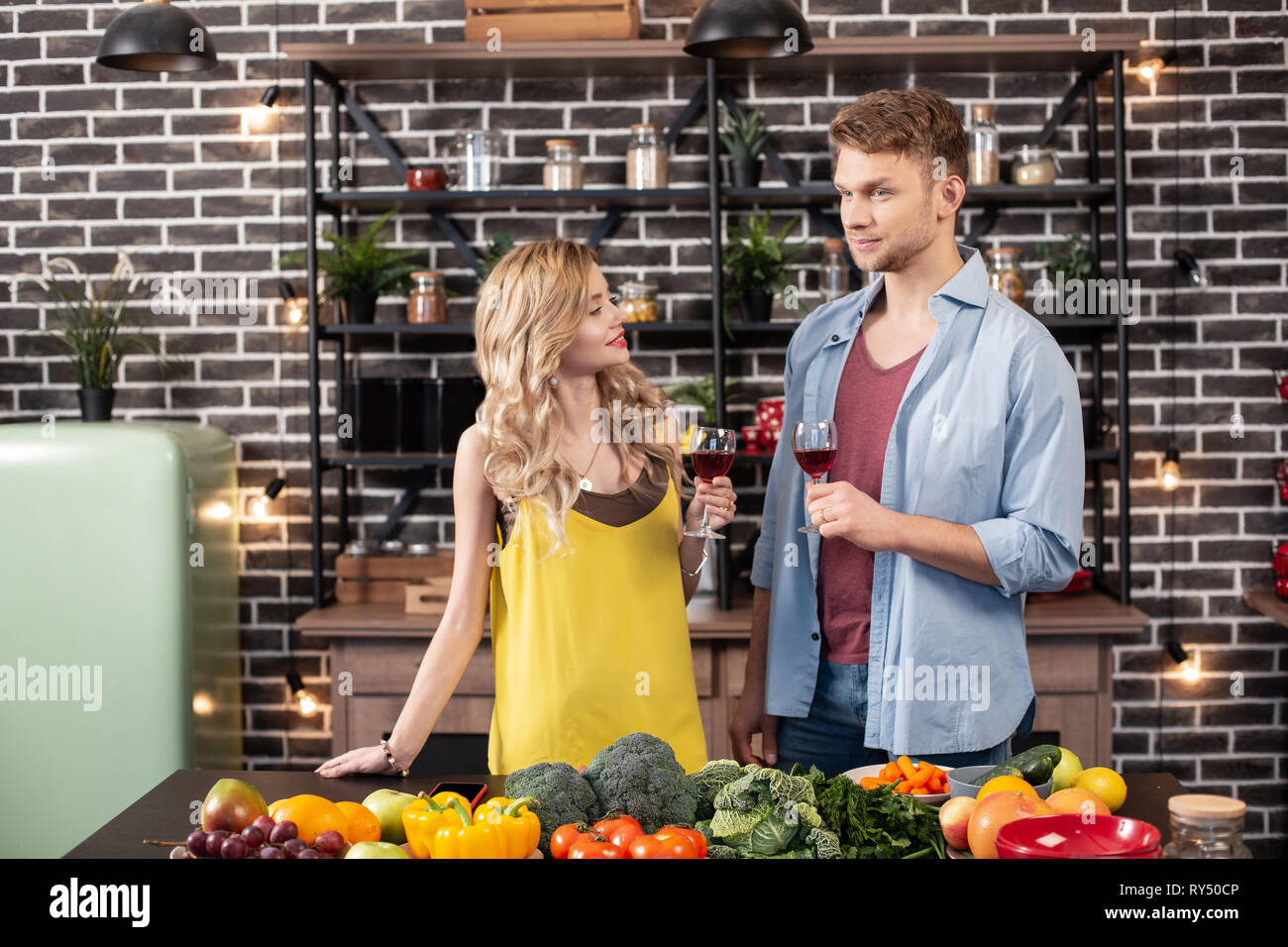 Loving couple cooking food hi-res stock photography and images - Alamy