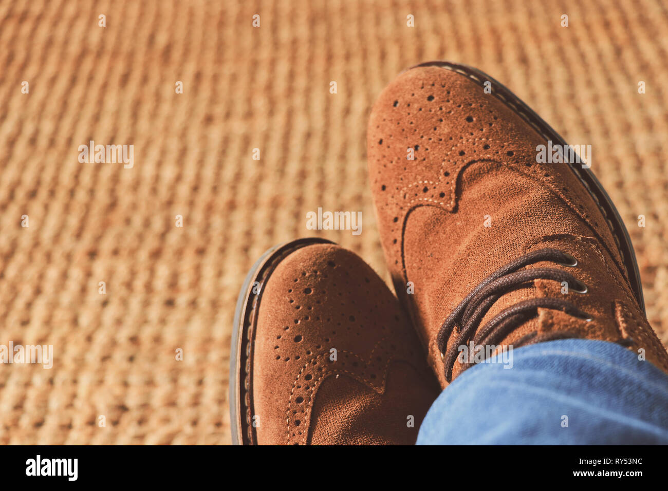 Top view from man with brown leather shoes and jeans Stock Photo - Alamy