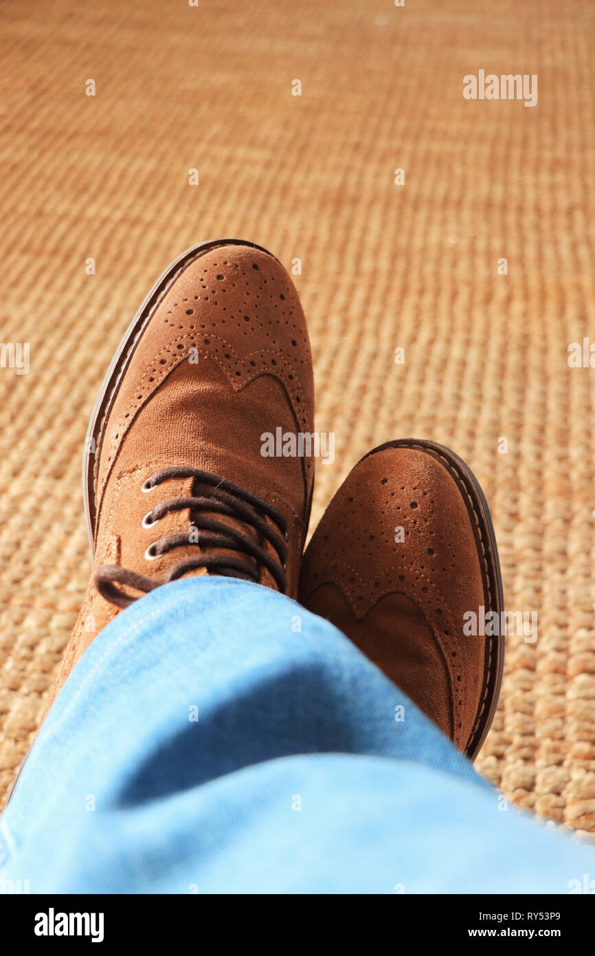 Top view from man with brown leather shoes and jeans Stock Photo - Alamy