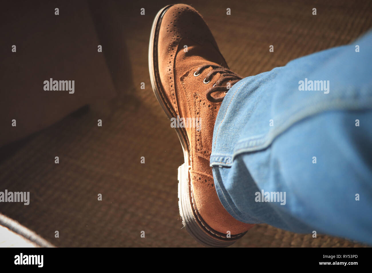 Top view from man with brown leather shoes and jeans Stock Photo - Alamy