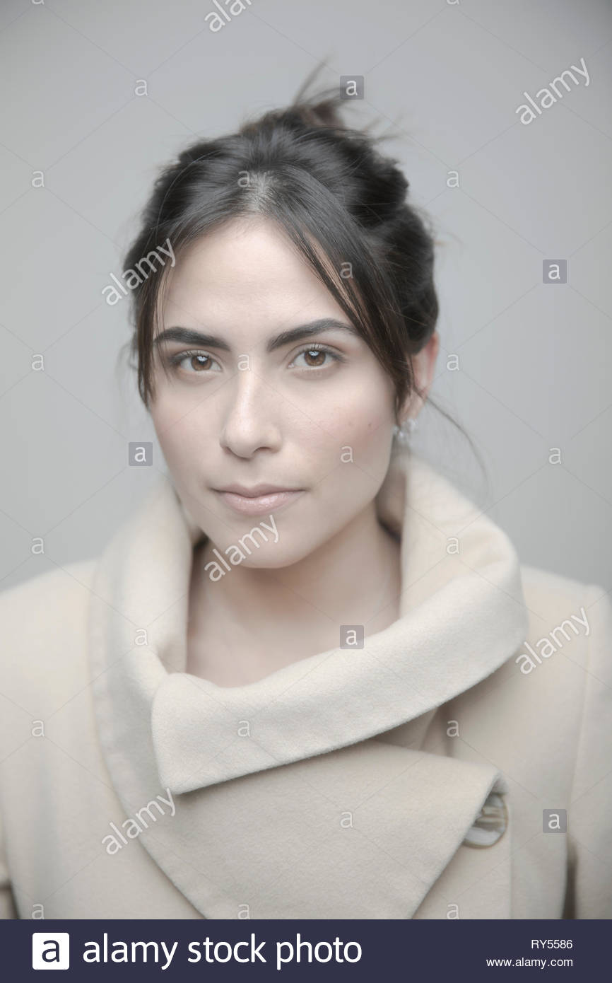 Woman in beige hi-res stock photography and images - Alamy