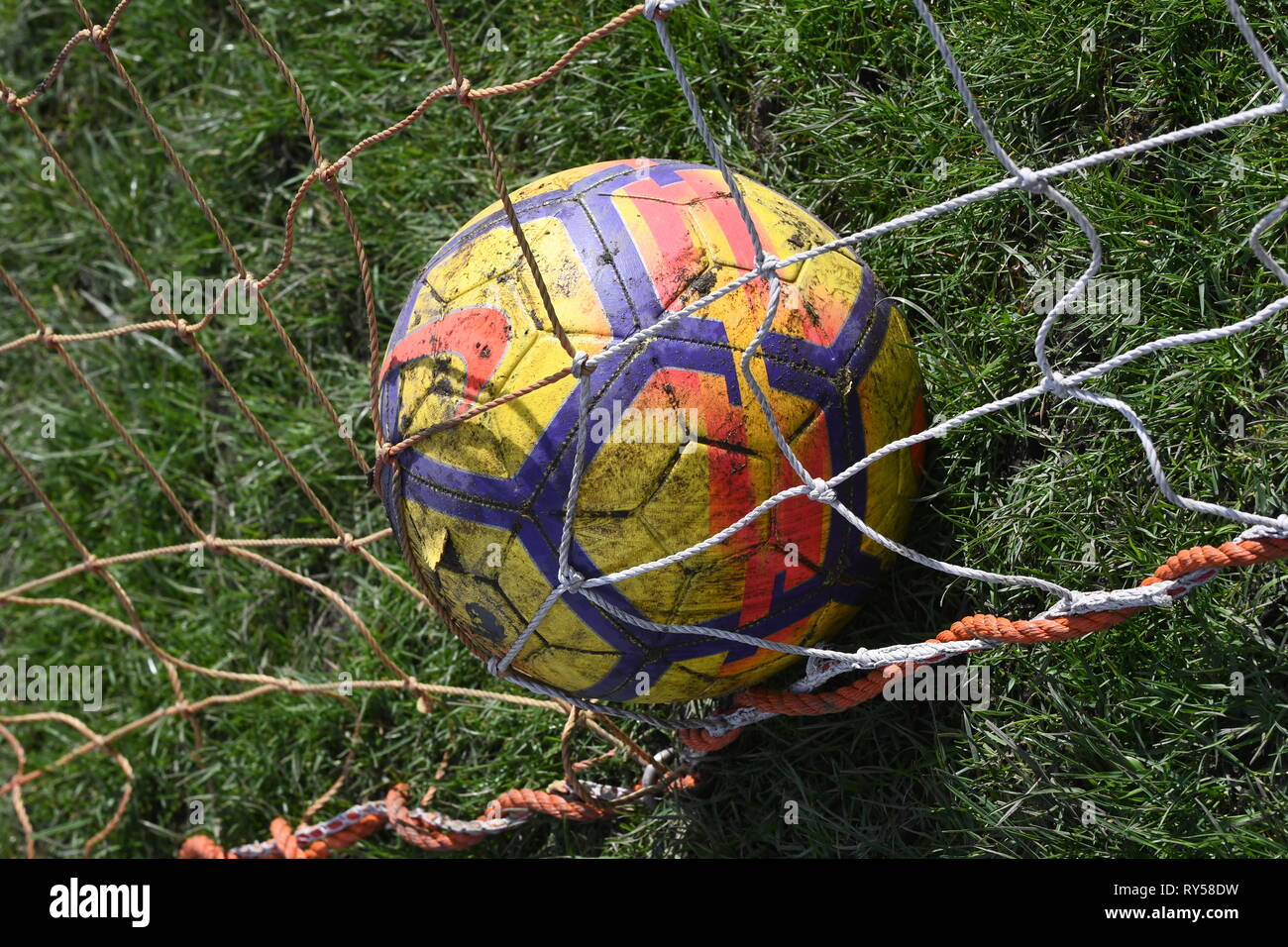 Football in nets hi-res stock photography and images - Alamy