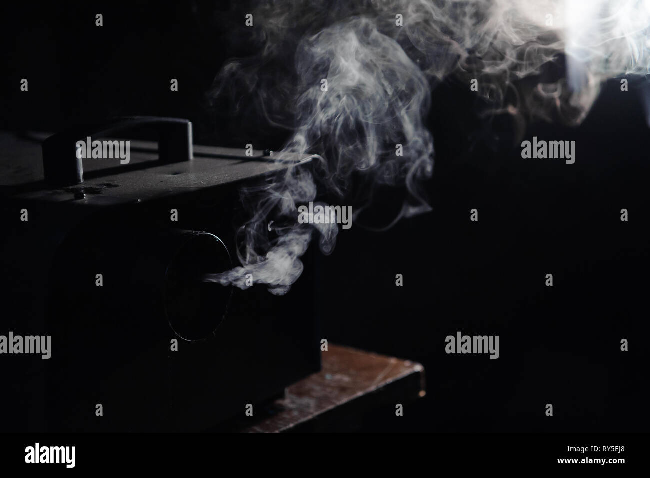 lights in smoke, studio lights shining through the smoke from smoke ...