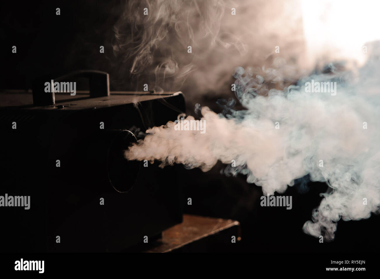 lights in smoke, studio lights shining through the smoke from smoke ...