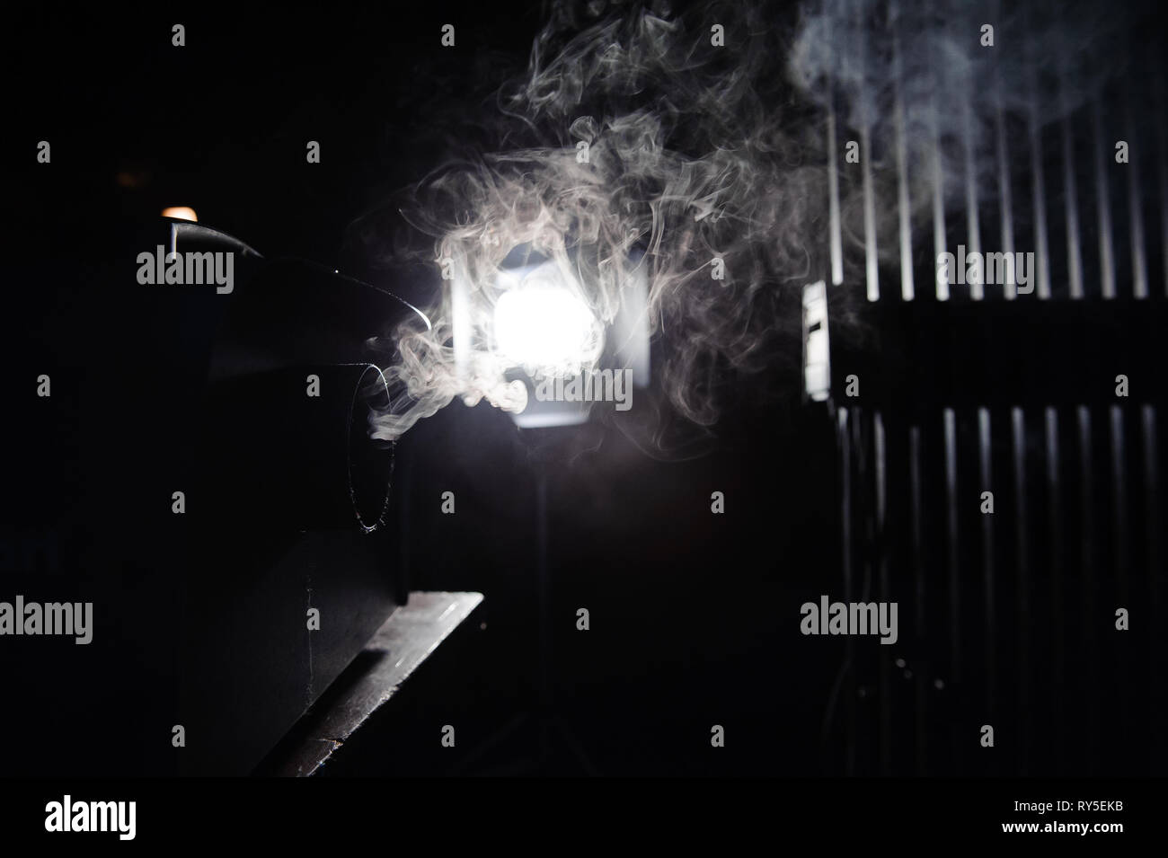 lights in smoke, studio lights shining through the smoke from smoke ...