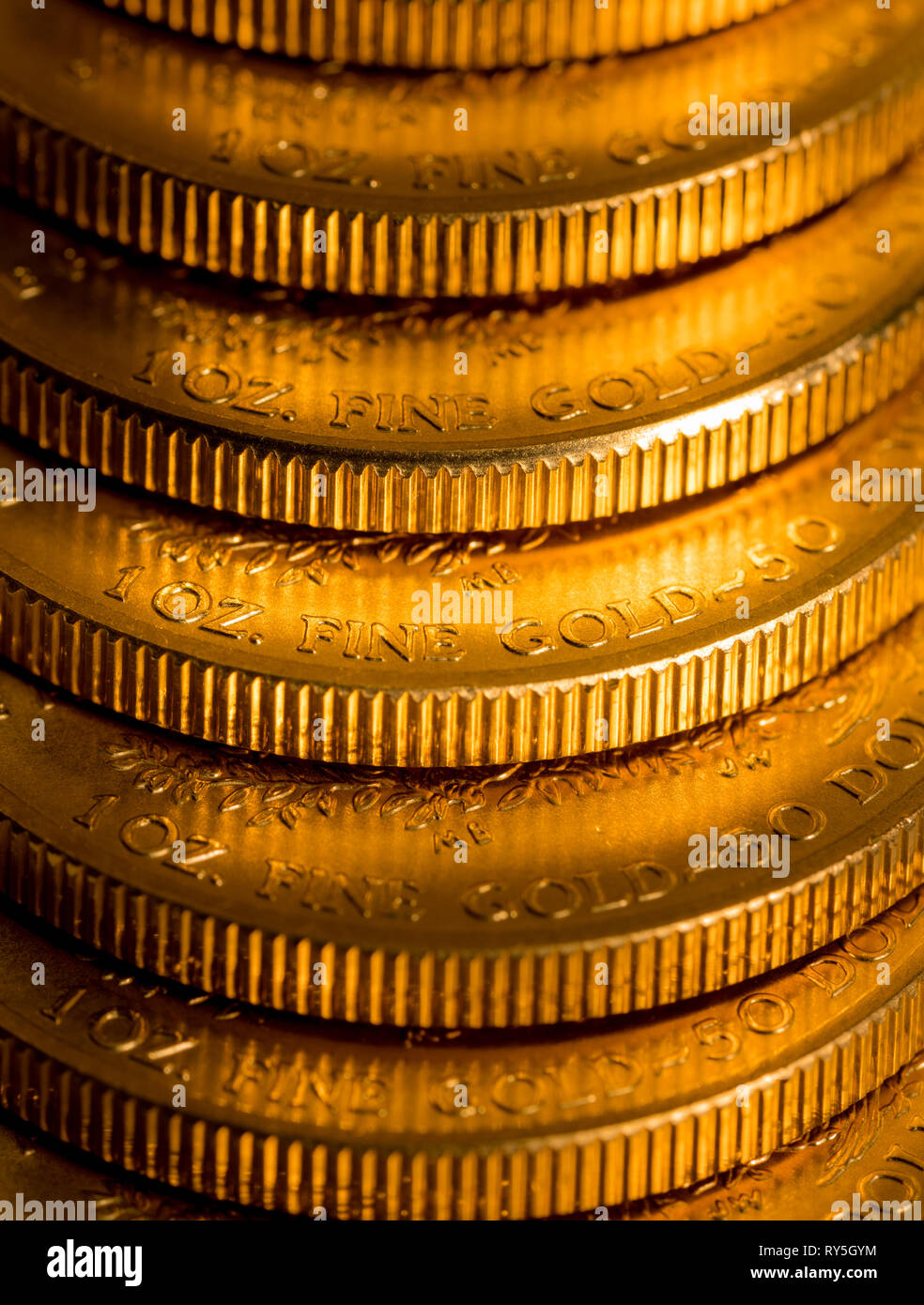 Stack of US Treasury Gold Eagle one ounce coins Stock Photo - Alamy