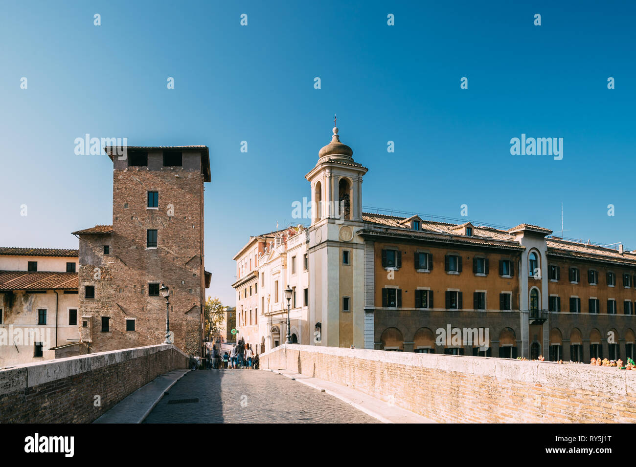 Rome, Italy. People Walking On Pons Fabricius Bridge Near San Giovanni ...
