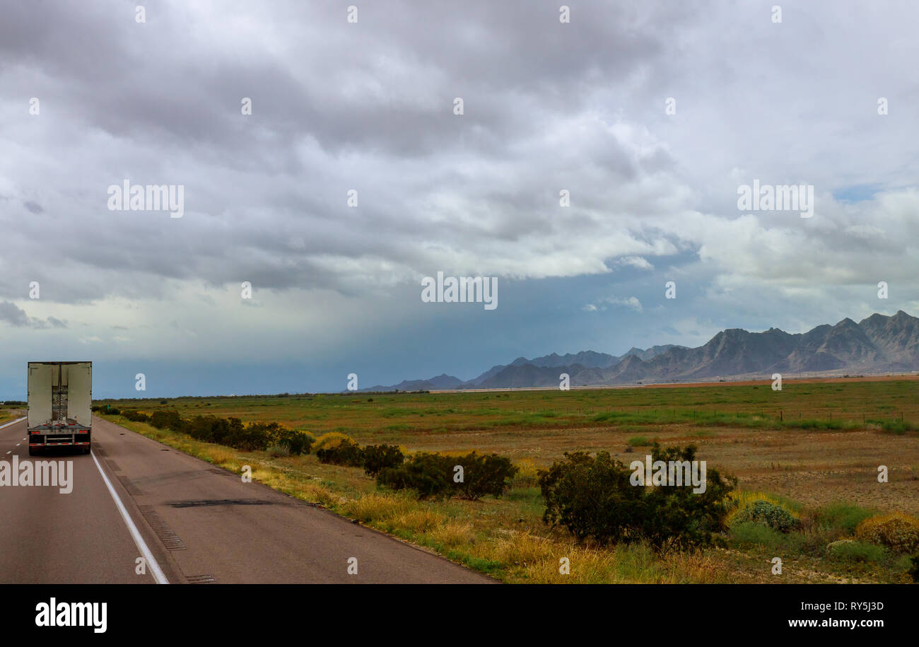 Traffic moving across heavy truck driving America on interstate Arizona ...