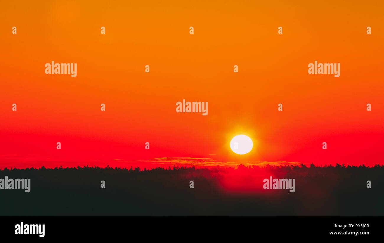 Sun Over Horizon At Sunset Or Sunrise. Natural Background In Warm ...