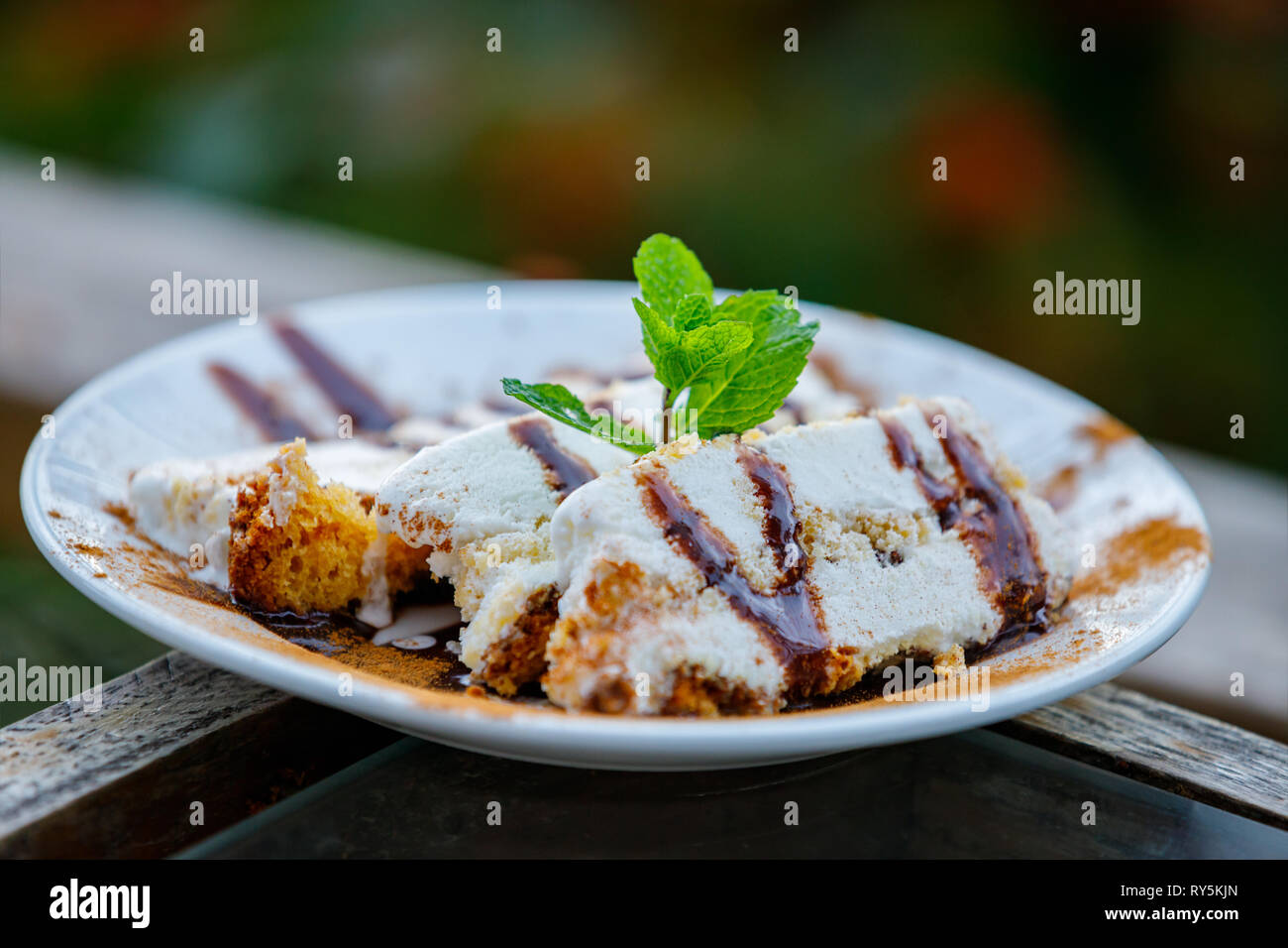 Extra Sweet Delicious Cake With Icing And Garnished With Mint, High ...