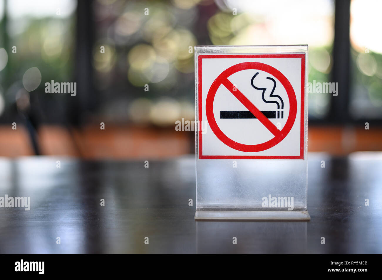 No smoking sign on wooden table in coffee shop Don't smoking place in ...
