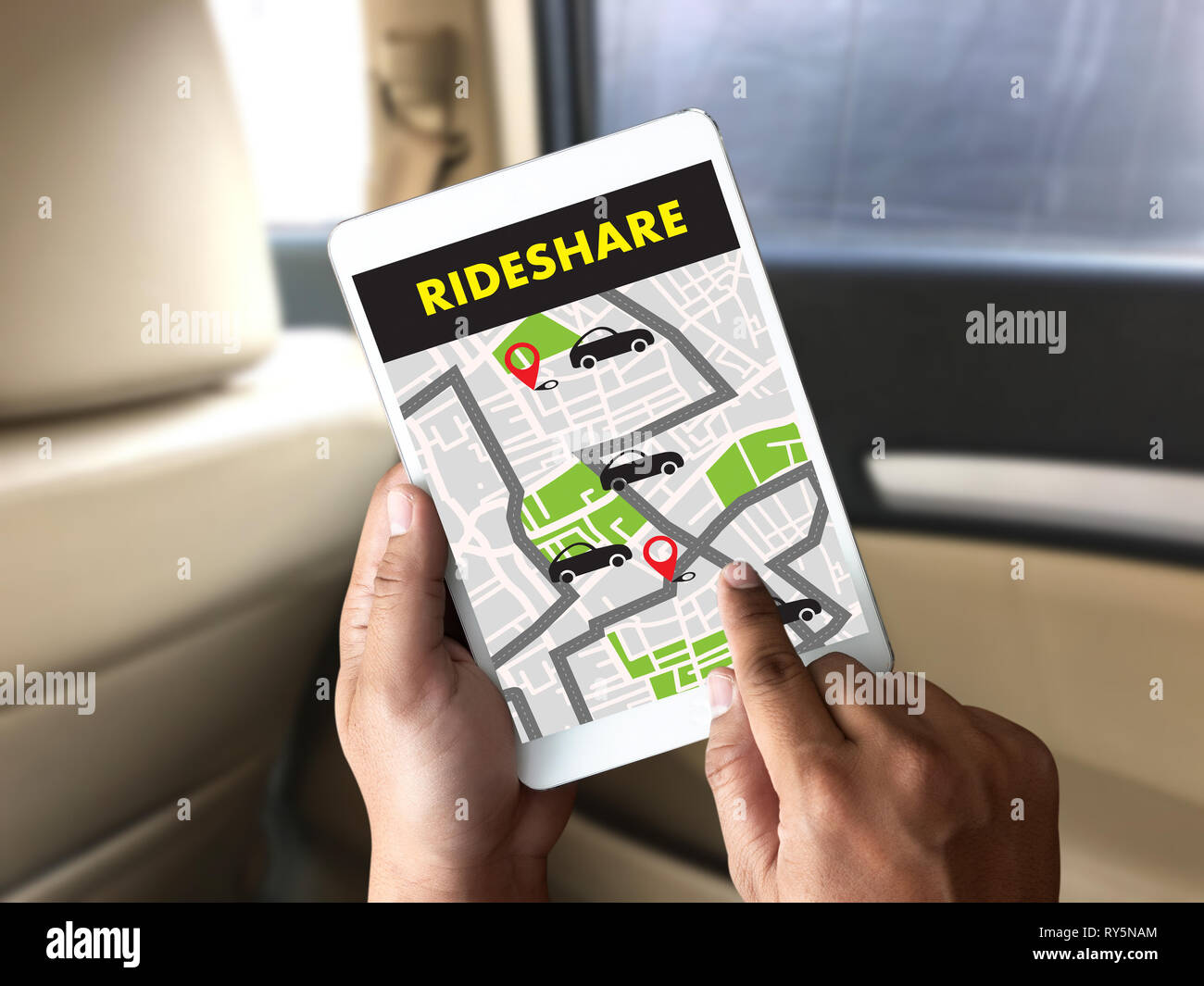 mobile application Ride share taxi service on phone man holding phone ...