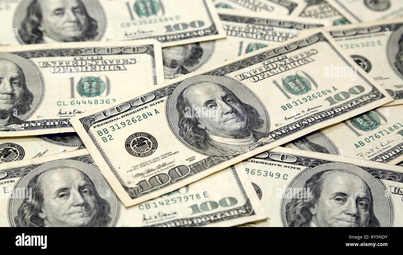 Full Screen Money Pile of 100 Dollar Bills Stock Photo - Alamy