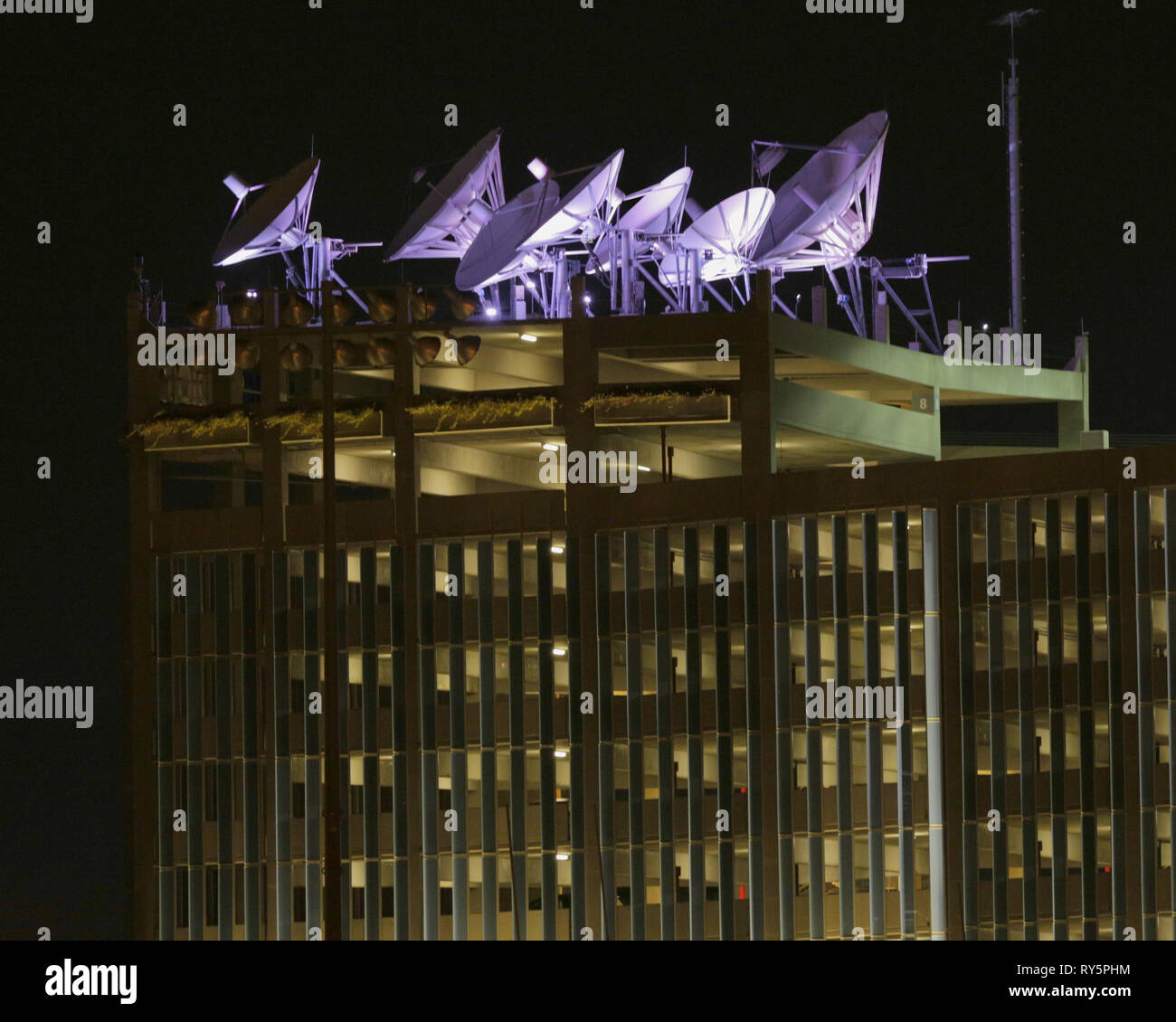 Satellite Dishes Array at Night Stock Photo - Alamy