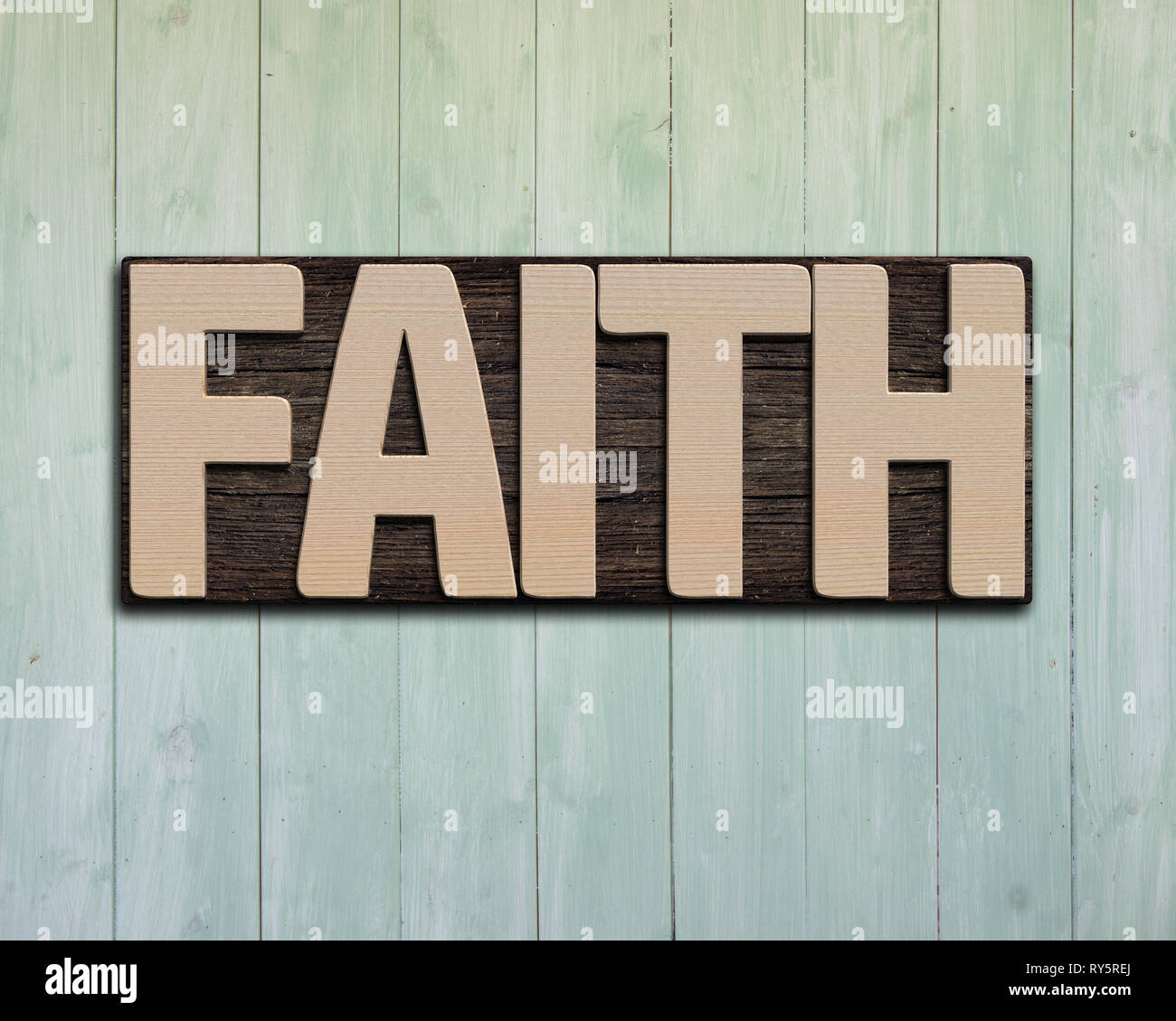 Faith wooden word on green wood wall Stock Photo - Alamy