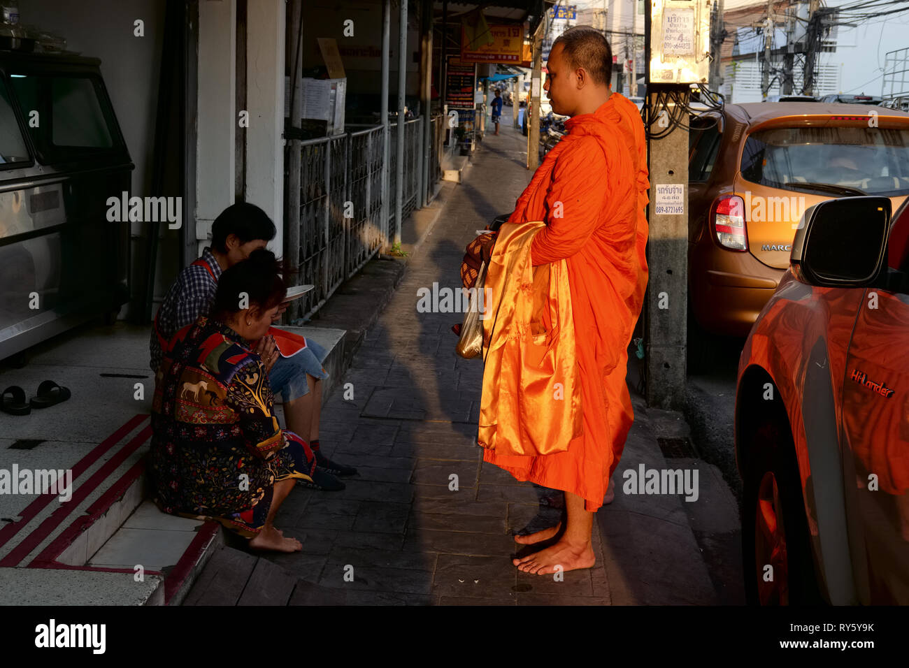Layman kneeling hi-res stock photography and images - Alamy