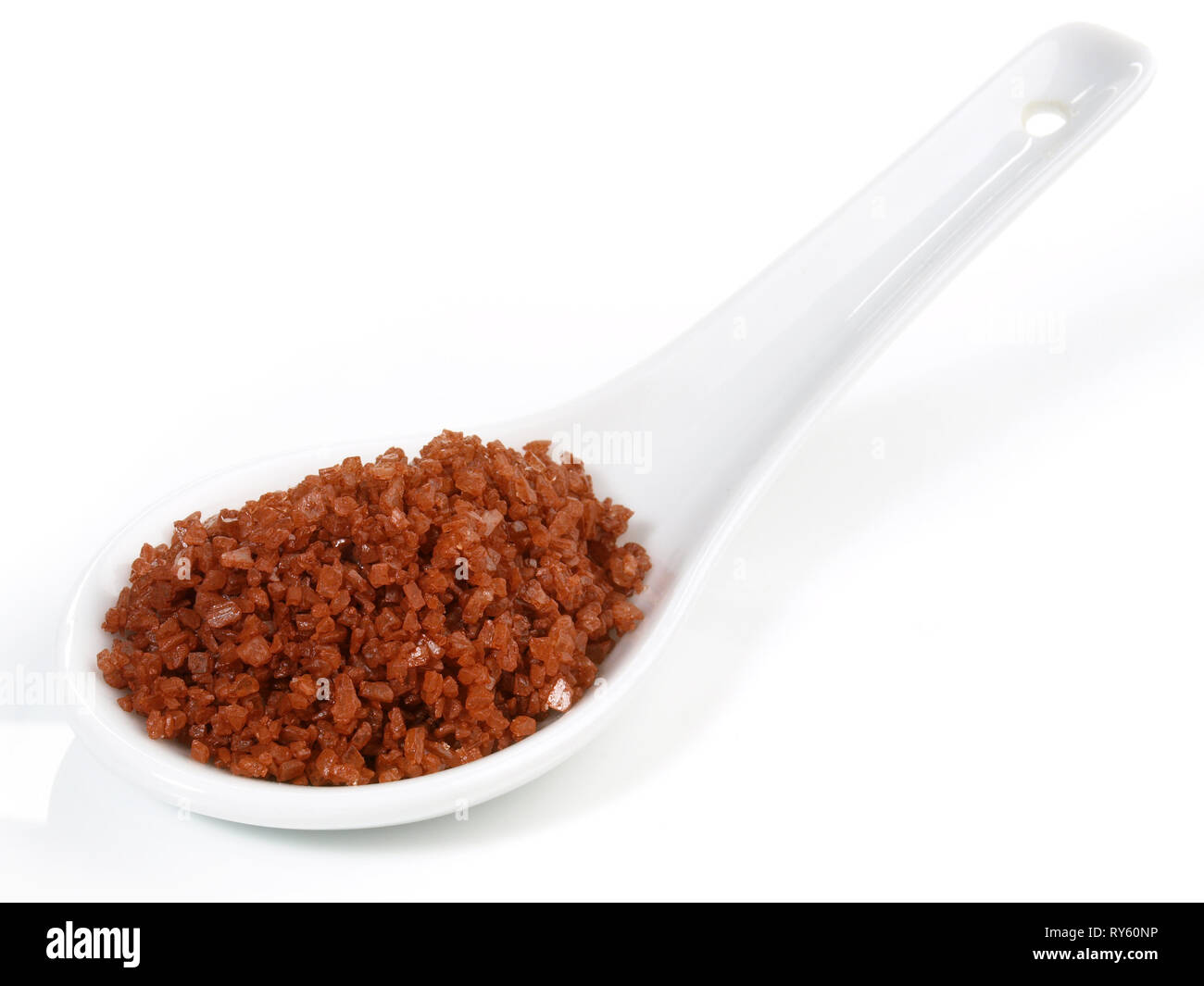 Red Stone Salt on white Background Stock Photo - Alamy