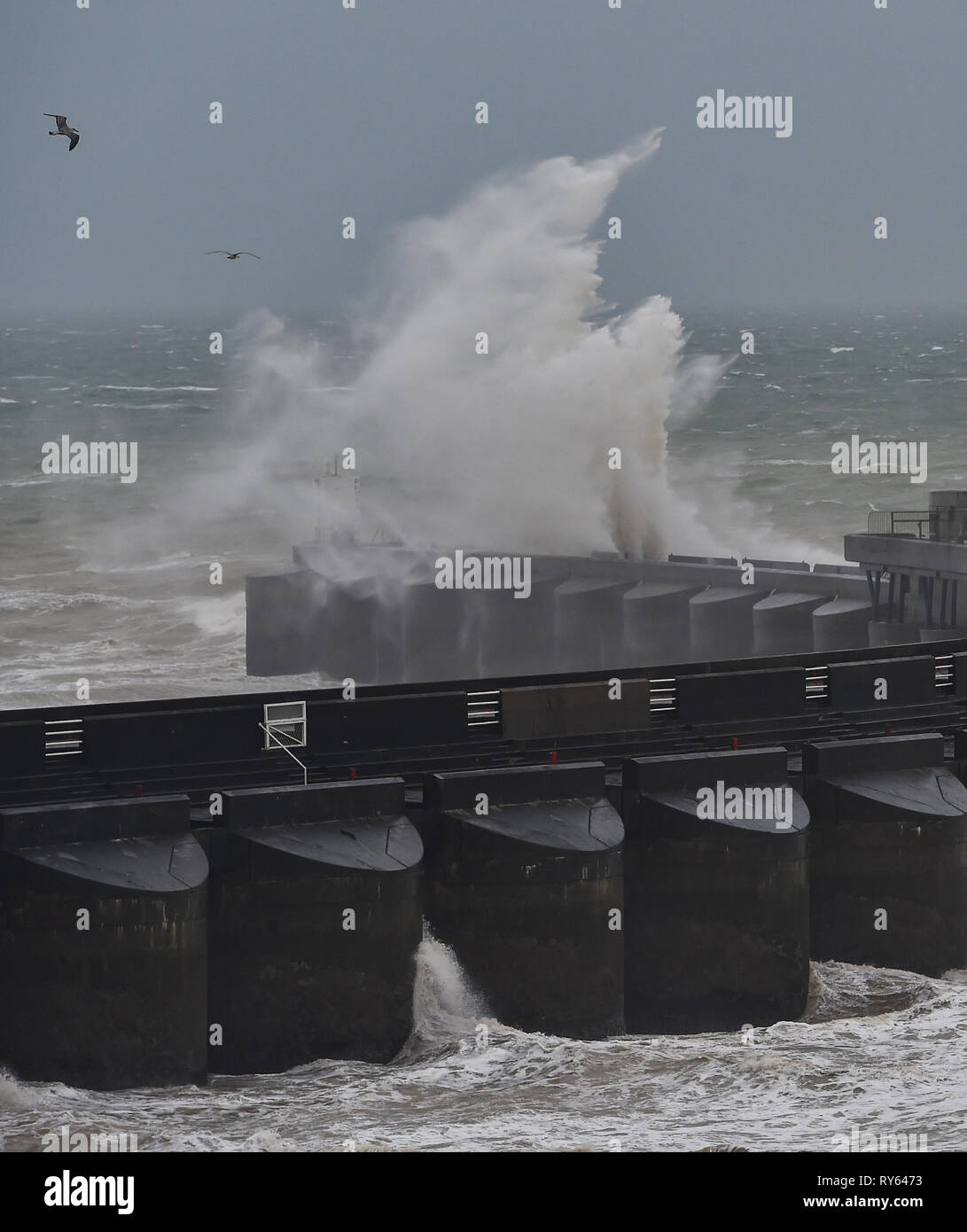 Waves crash over marina wall hi-res stock photography and images - Alamy