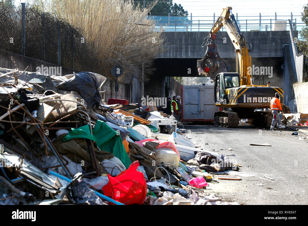 Scrapers disposing of the trash Rome March 12th 2019. Salviati Roma ...