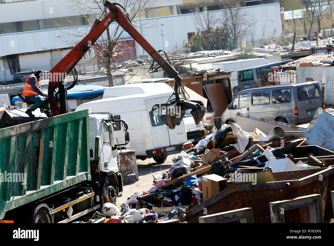 Scrapers disposing of the trash Rome March 12th 2019. Salviati Roma ...