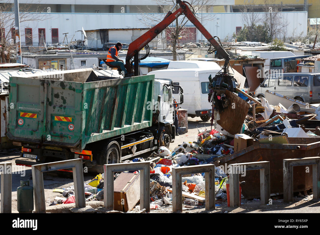 Scrapers disposing of the trash Rome March 12th 2019. Salviati Roma ...