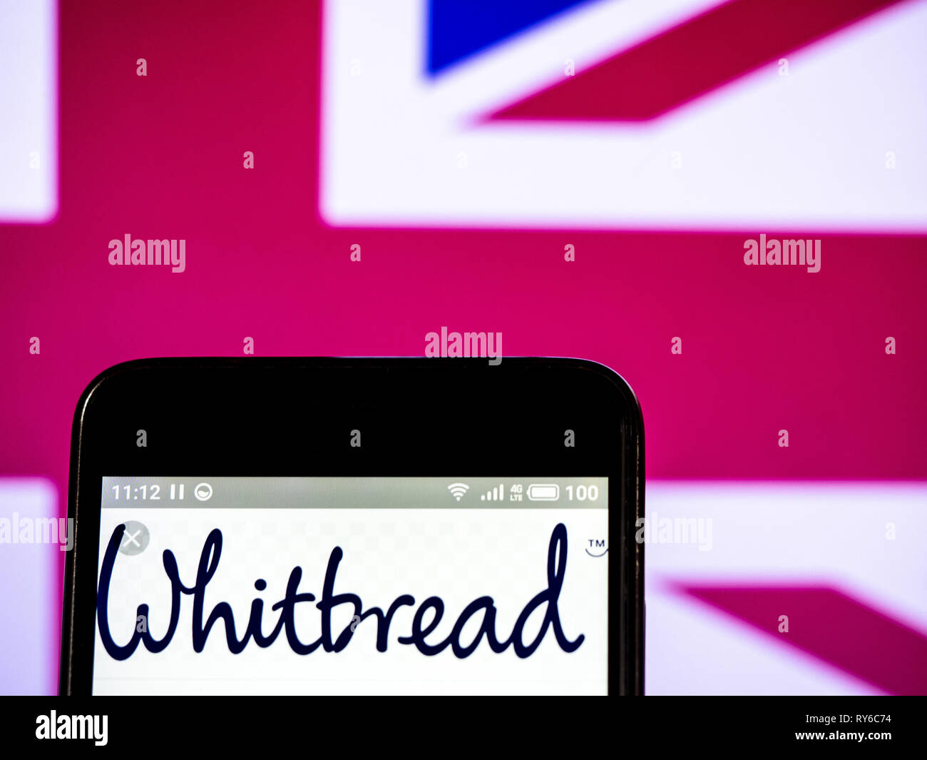 Ukraine. 12th Mar, 2019. Whitbread plc company logo seen displayed on a ...