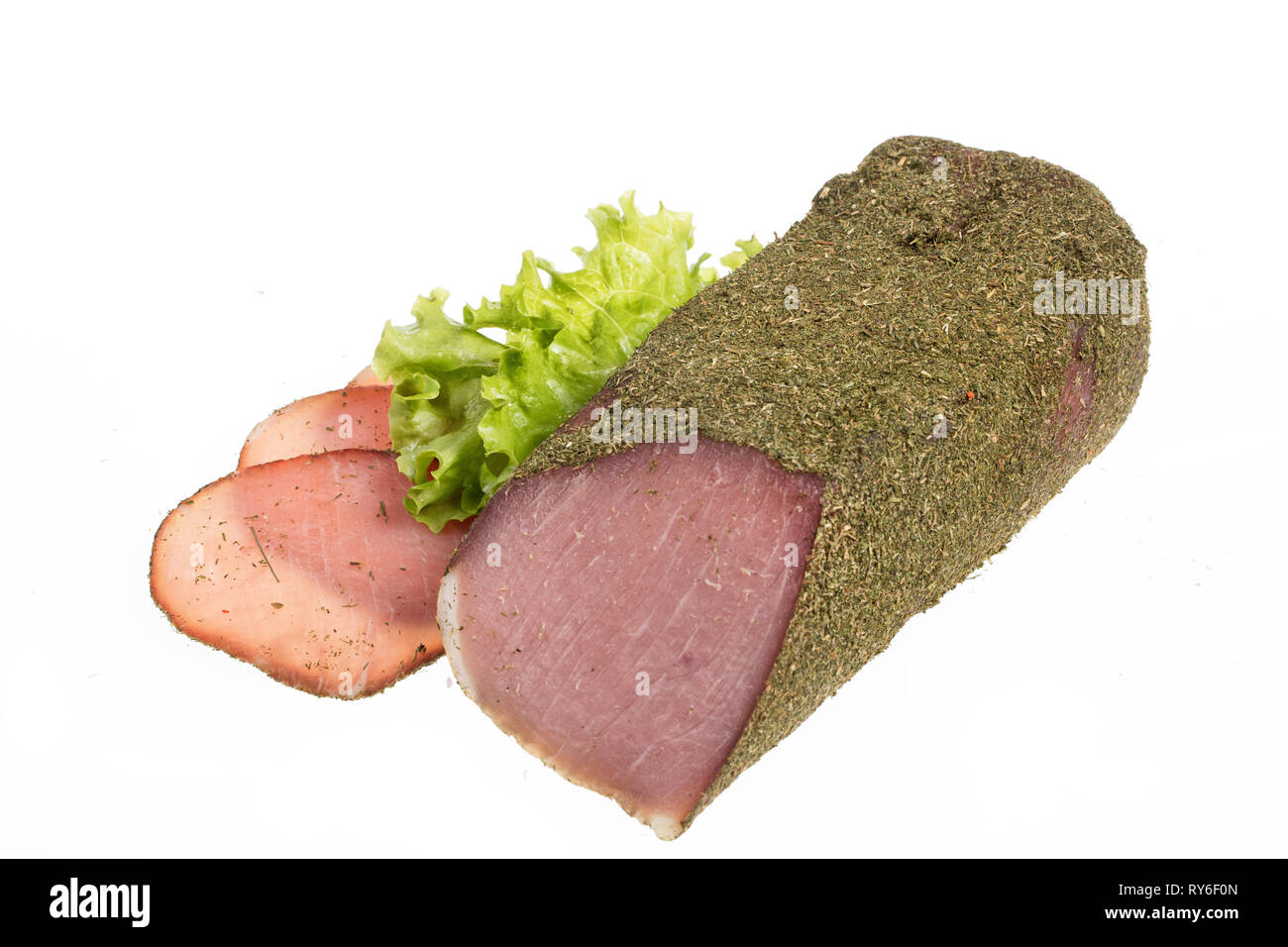 Ham with greenery on an isolated studio background Stock Photo - Alamy