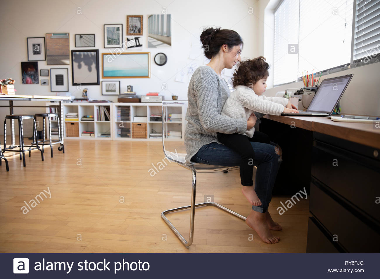 Baby working on laptop hi-res stock photography and images - Alamy