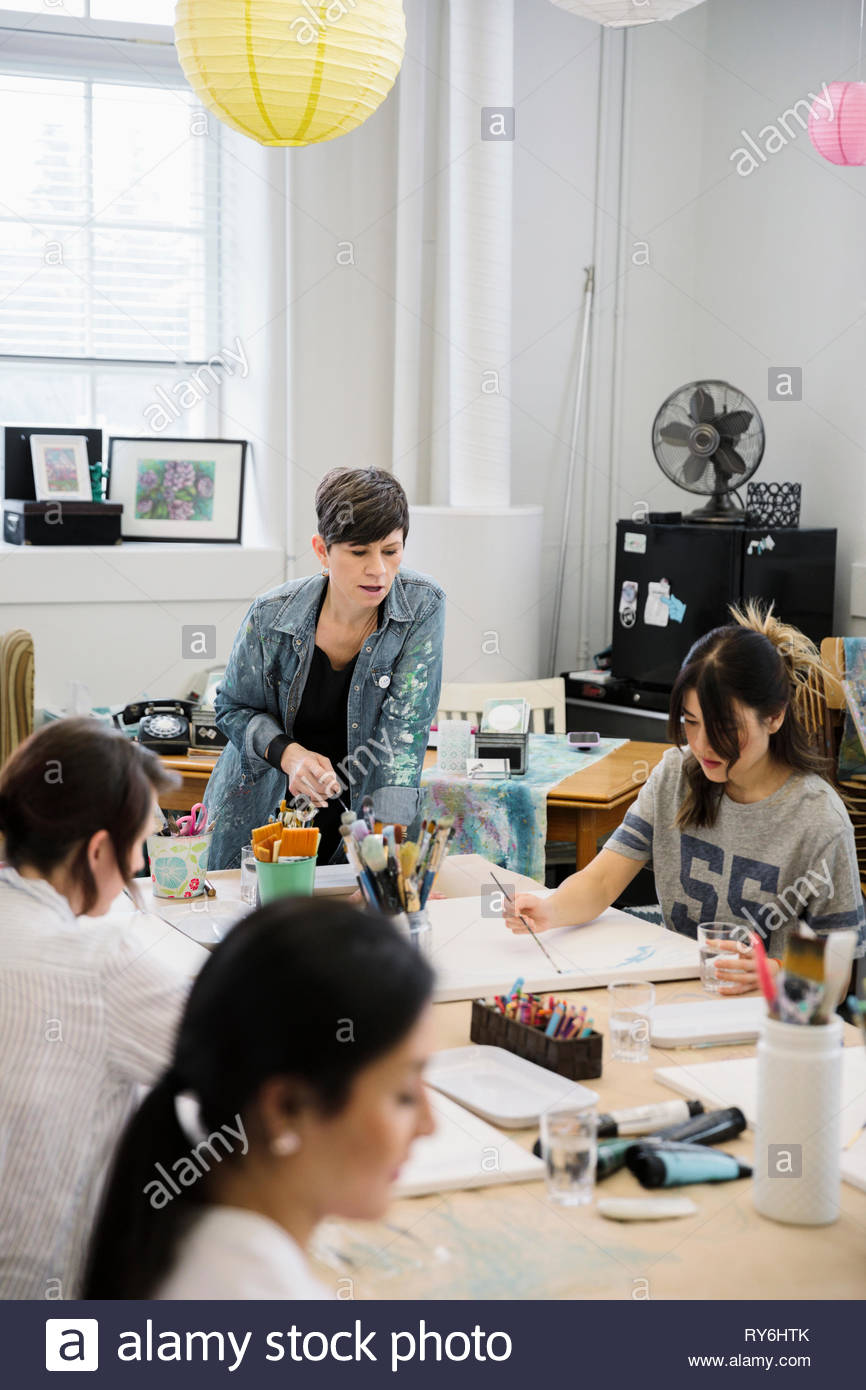 Women painting in art class Stock Photo - Alamy