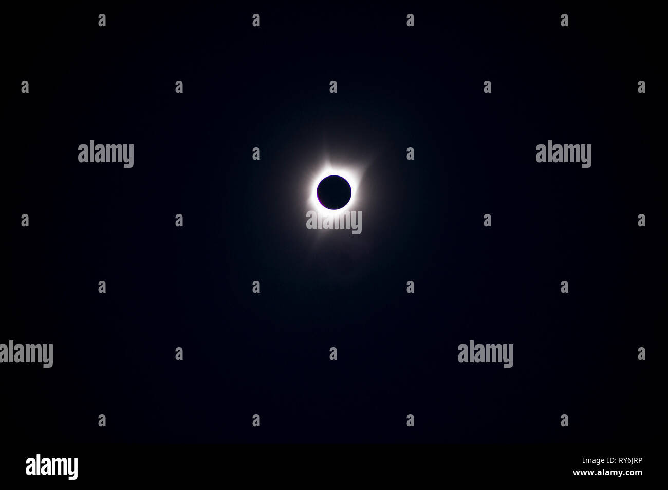 Low angle view of solar eclipse at night Stock Photo - Alamy