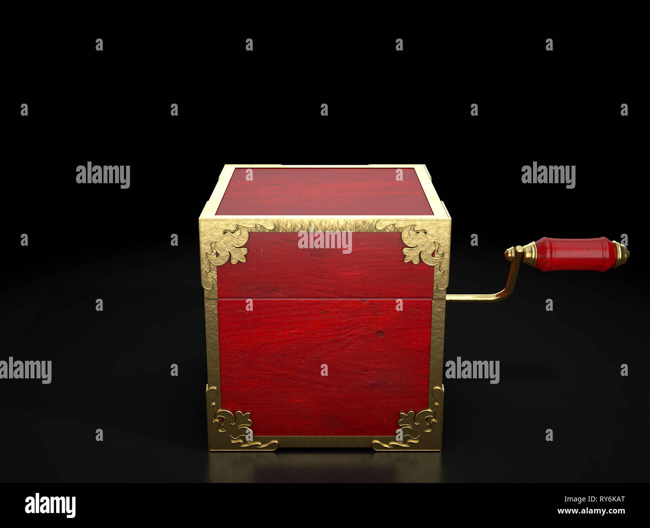 An antique closed jack-in-the-box mad of red wood and gold trimmings on ...