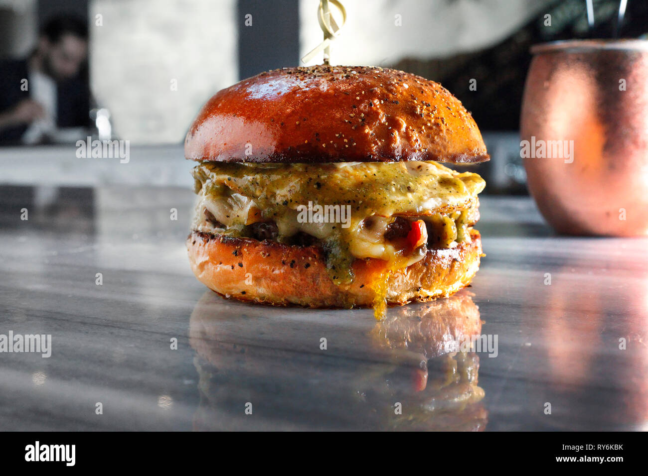 Burger on table hi-res stock photography and images - Alamy