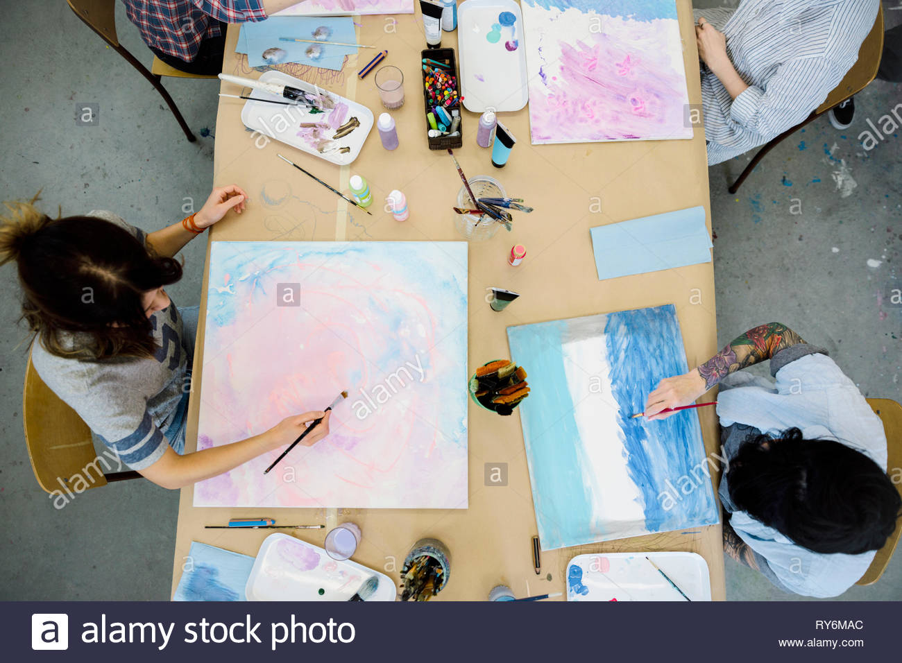 Two women looking at paintings hi-res stock photography and images - Alamy