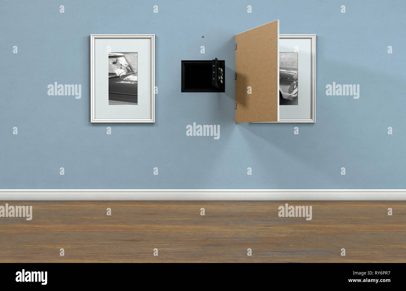 An open hidden wall safe revealed behind a hanging framed picture on a ...
