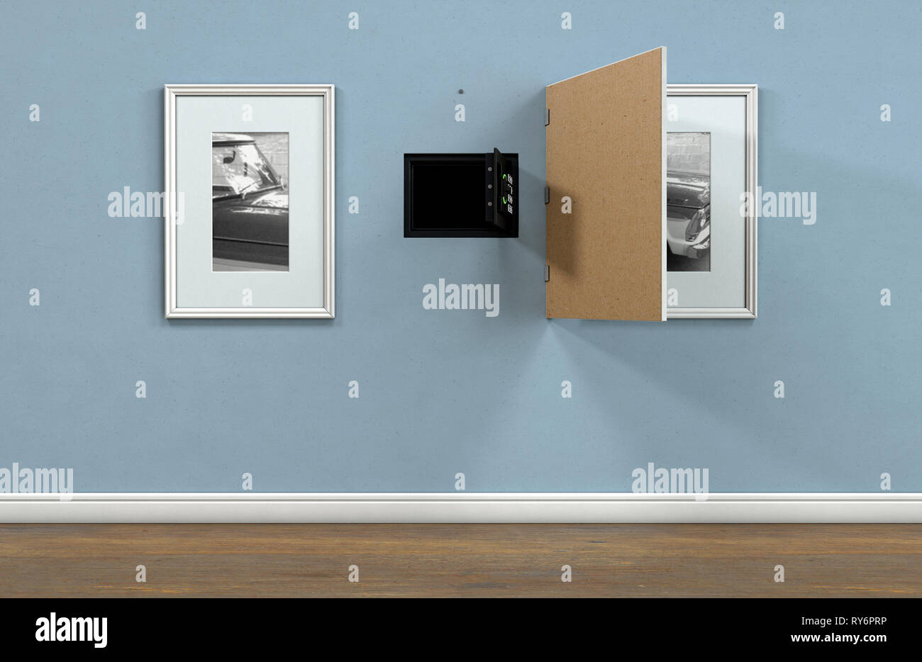 An open hidden wall safe revealed behind a hanging framed picture on a ...