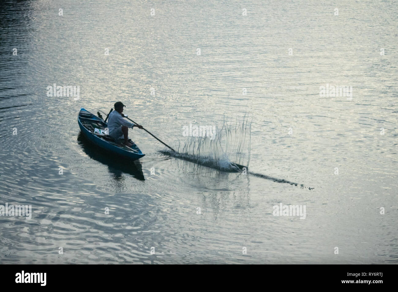 Bamboo fishing pole hi-res stock photography and images - Alamy