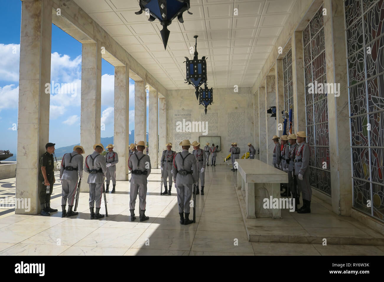Filipino soldiers in formation by marble columns on Mount Samat, Bataan ...